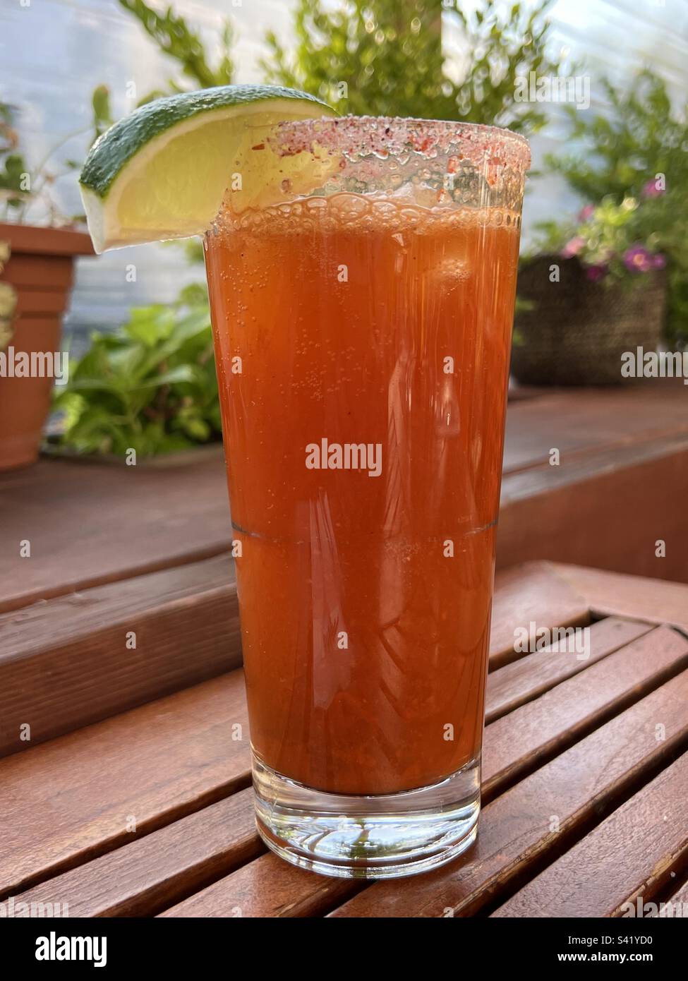 Mexican Drink Michelada: Beer, Lime and assorted Chile sauces Stock ...