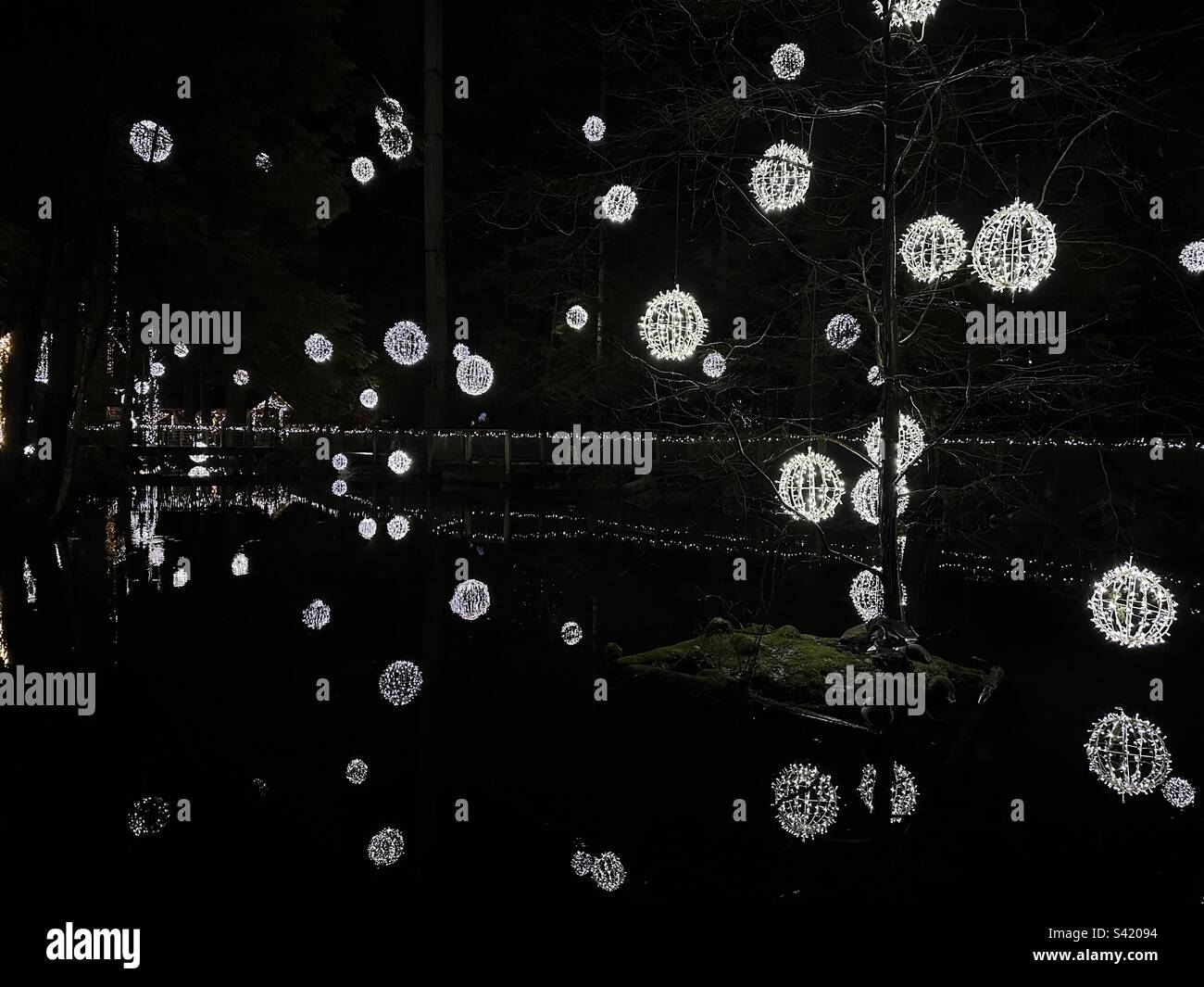Floating lights guiding your path through the darkness Stock Photo - Alamy