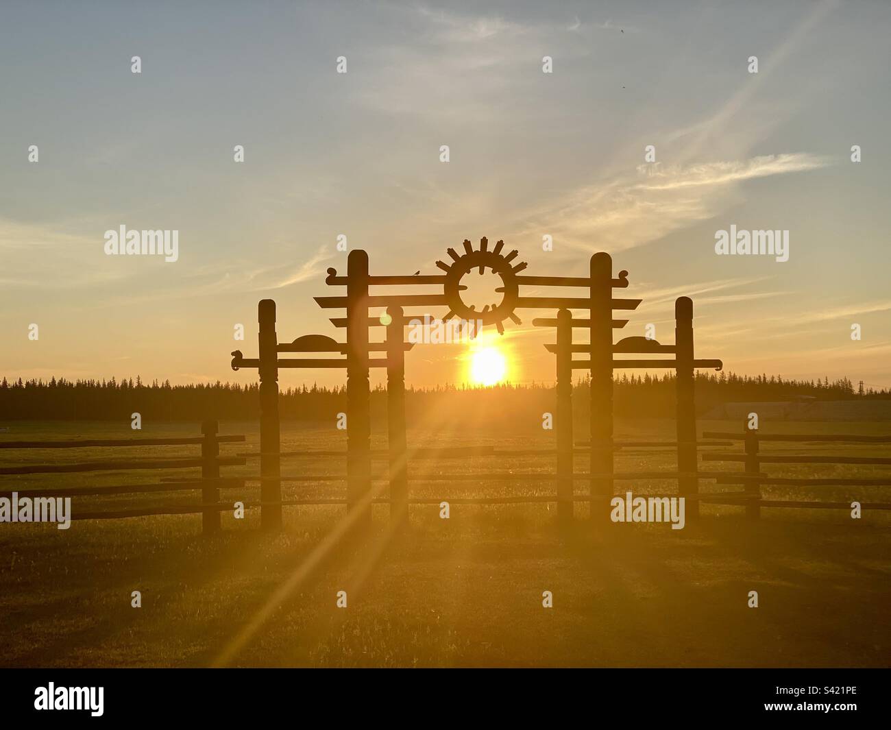 Yakut patterns on the gate at the meeting of the sunrise in the field ...