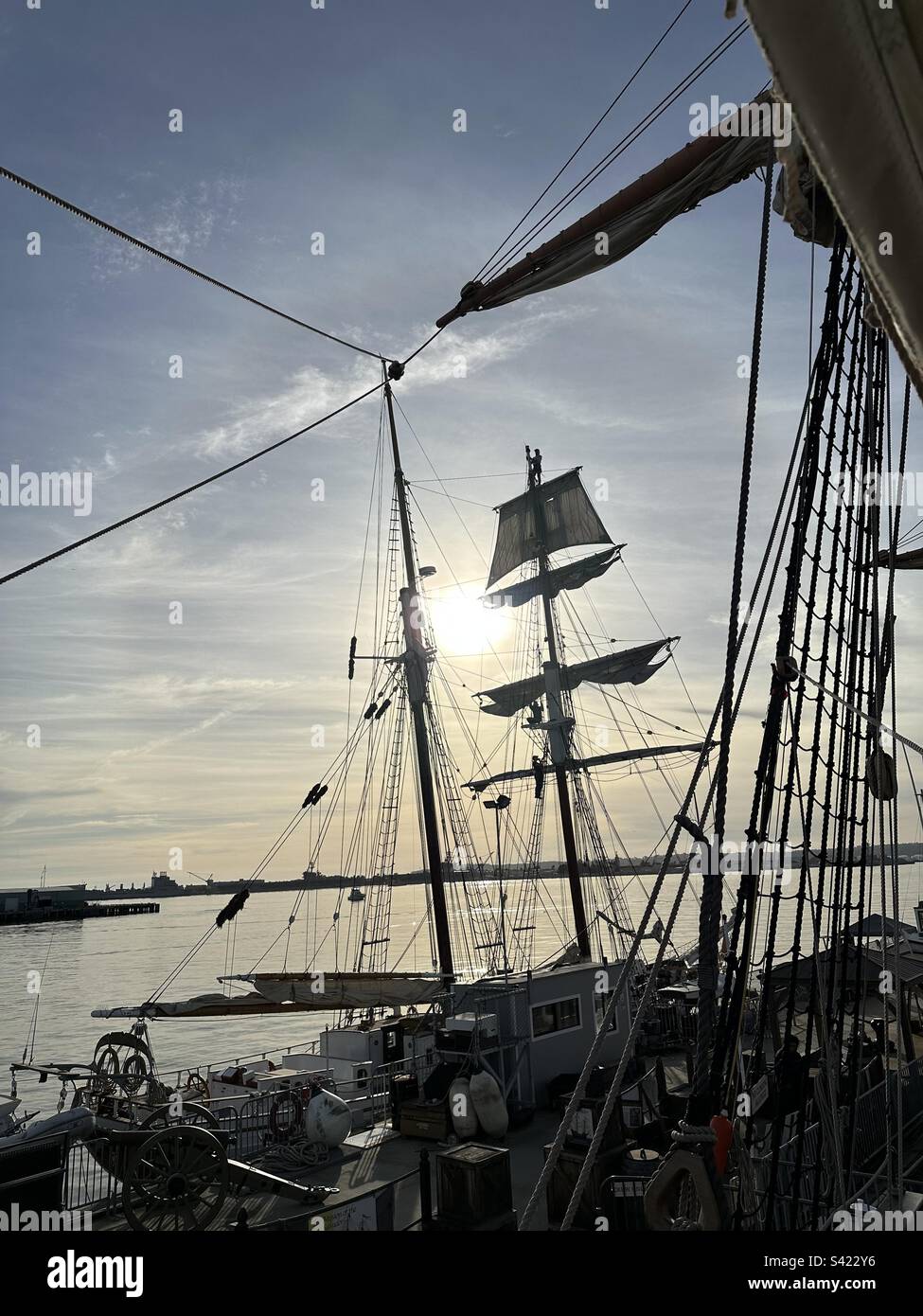 Men working on mast of tall ship at Maritime Museum of San Diego with ...