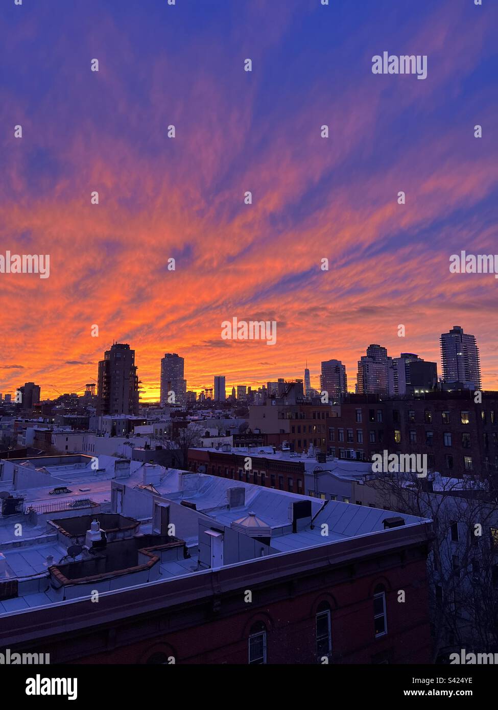 Sunset over New York City on January 13, 2023 Stock Photo - Alamy