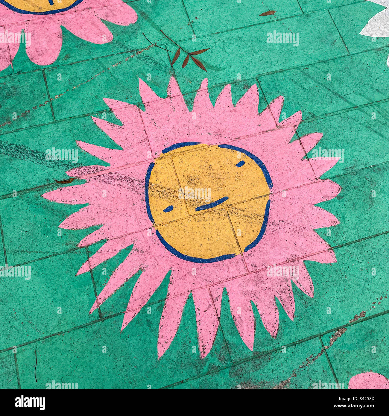 Happy flower pavement picture Stock Photo - Alamy