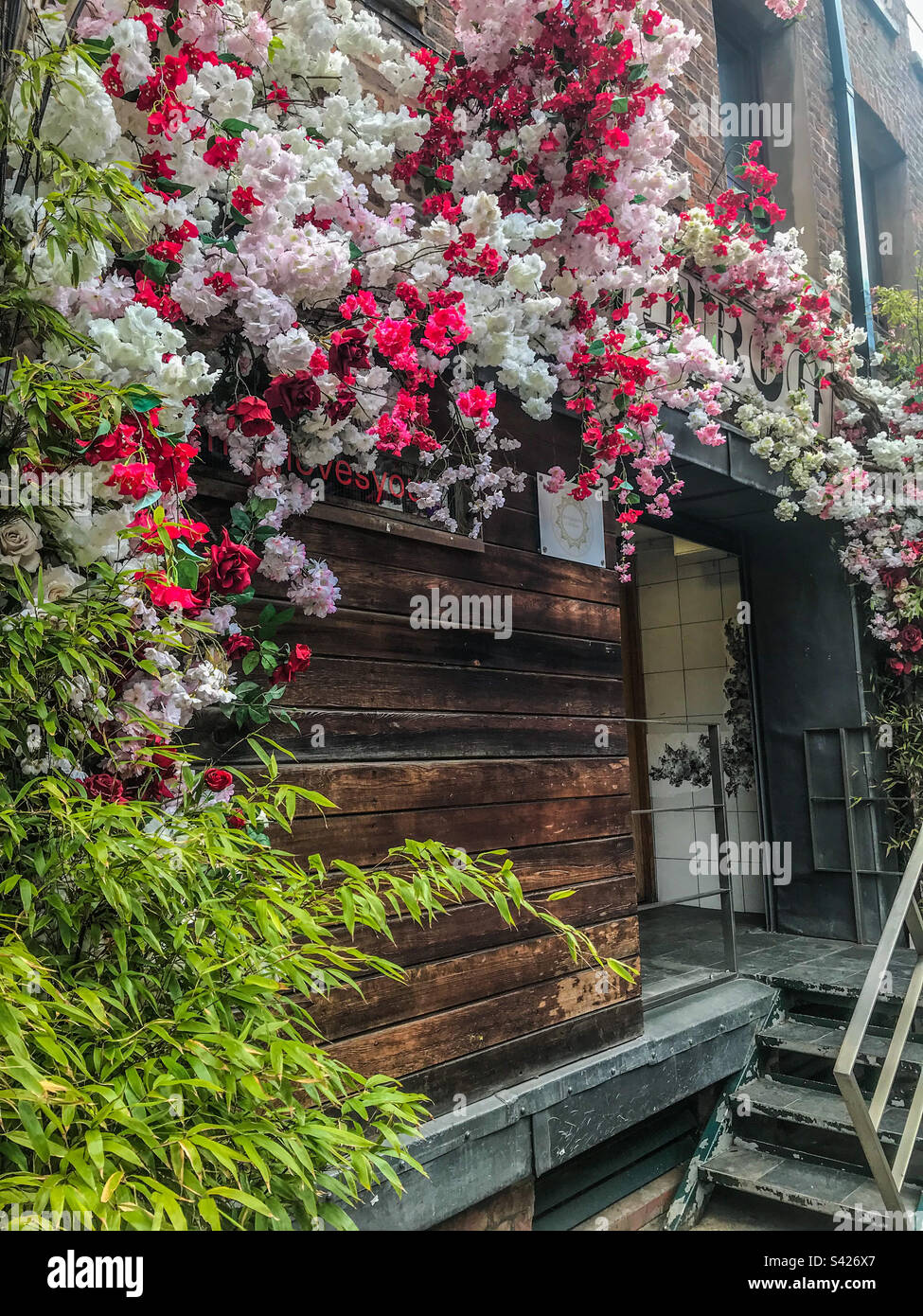 Pretty floral entrance to a salon, Manchester Stock Photo - Alamy