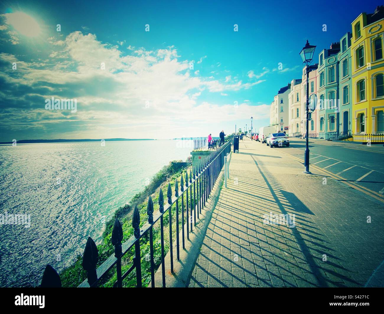 A photograph of Tenby promenade on a beautiful sunny day Stock Photo ...