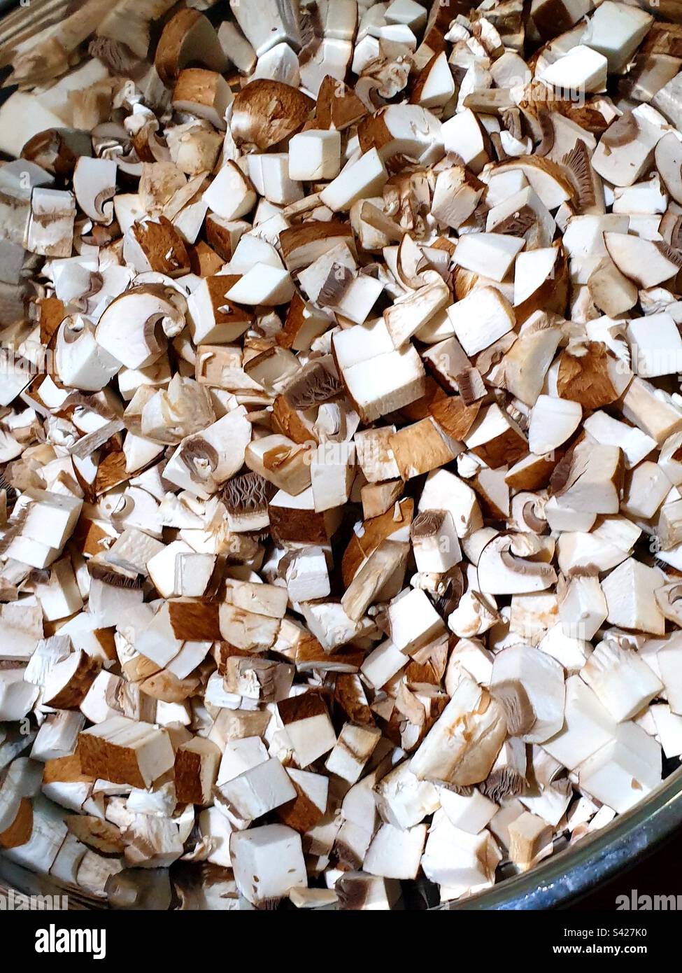 Bowl of chopped mushrooms Stock Photo - Alamy