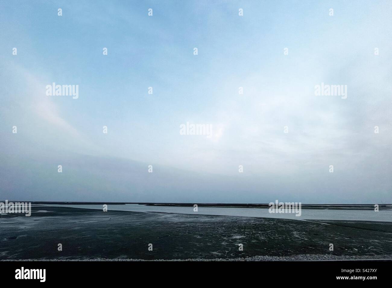 Ria Formosa lagoon system has a vast area of marshland, channels and ...