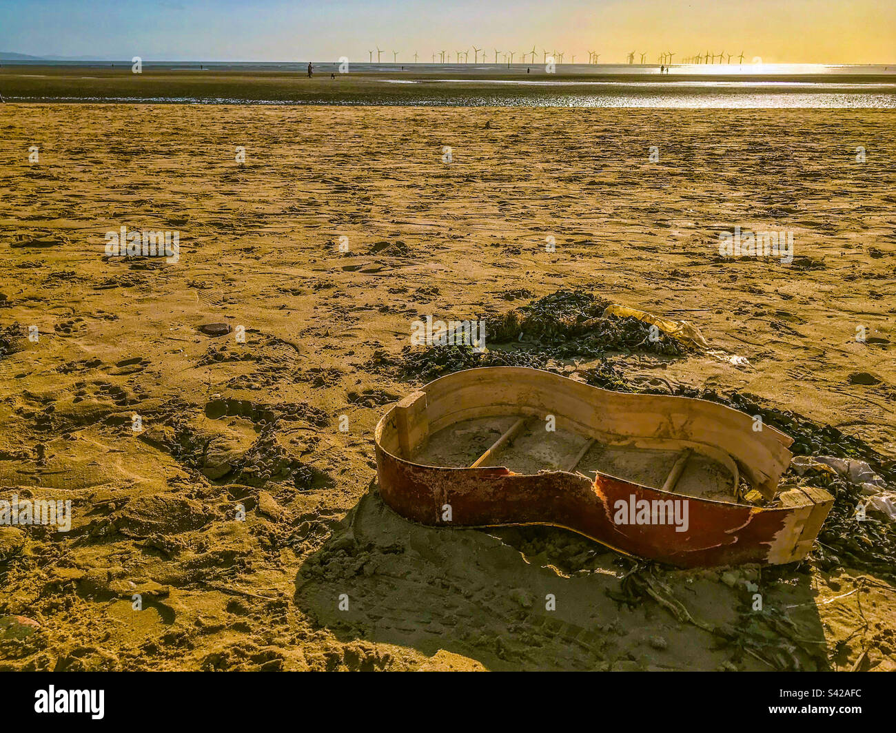 Broken acoustic guitar at the beach Stock Photo - Alamy