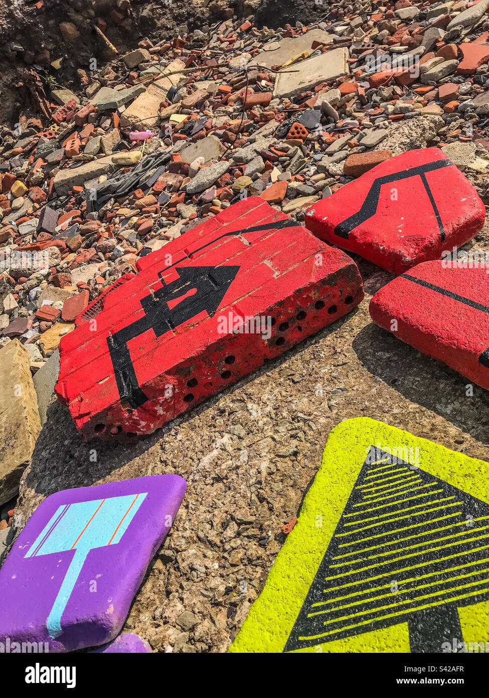 Strange coloured blocks on Blitz beach Stock Photo - Alamy