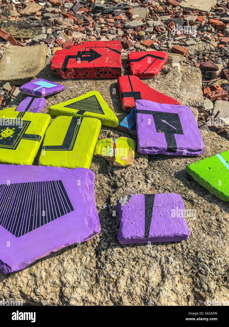 Strange coloured blocks on Blitz beach Stock Photo - Alamy