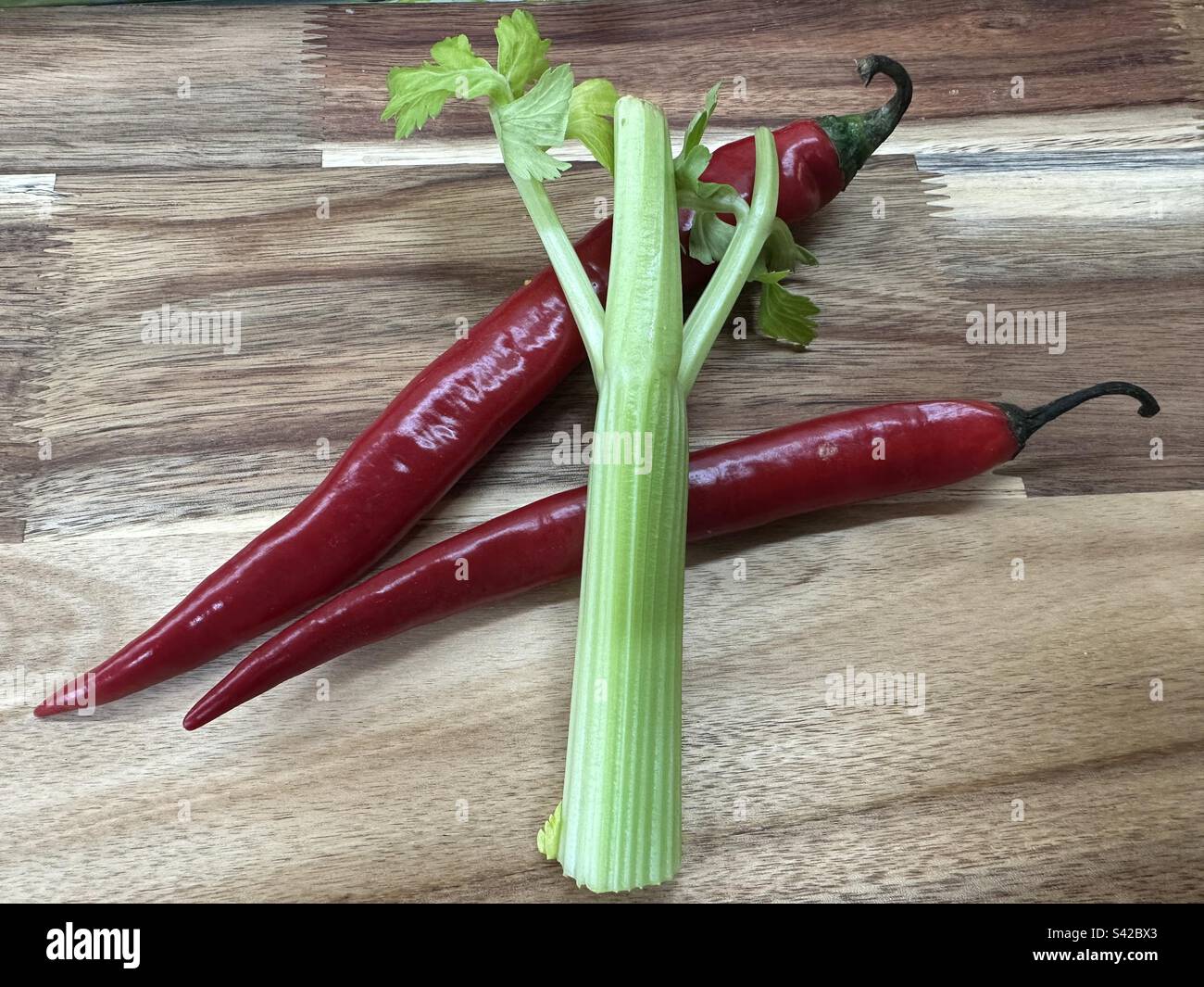 Long Chilli and Celery Sticks Stock Photo - Alamy