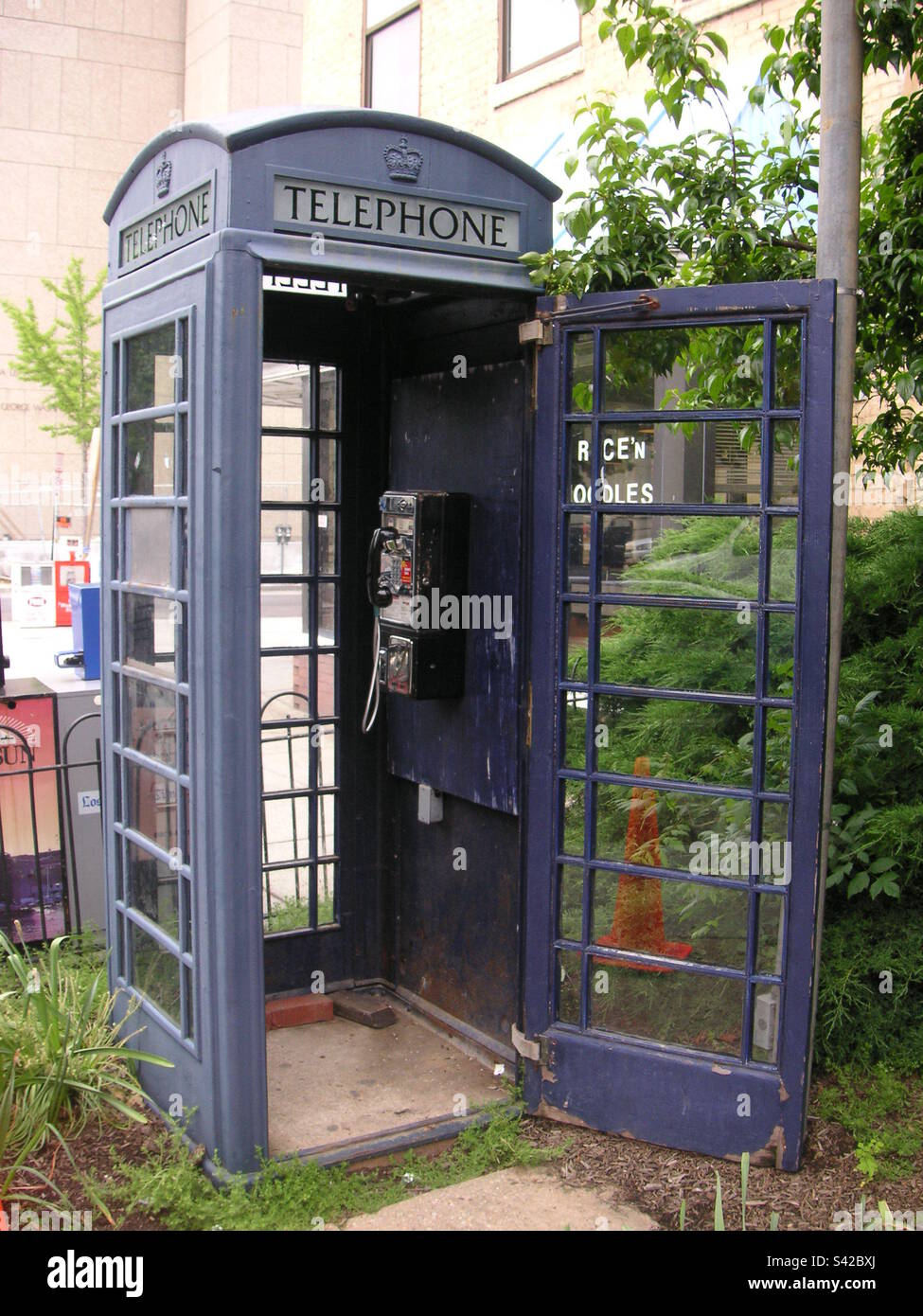 Unusual gray London phone booth Stock Photo - Alamy