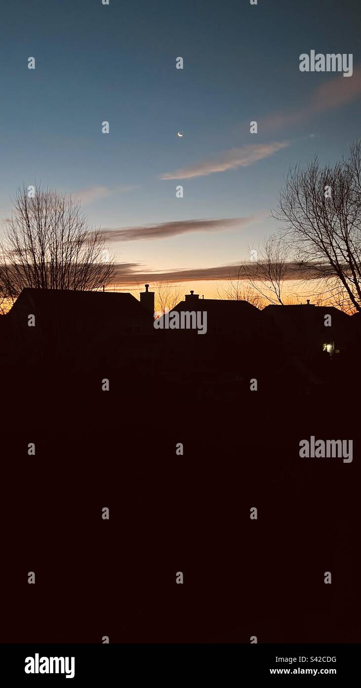 A calm winter evening with the view of the moon. 2022 Stock Photo - Alamy
