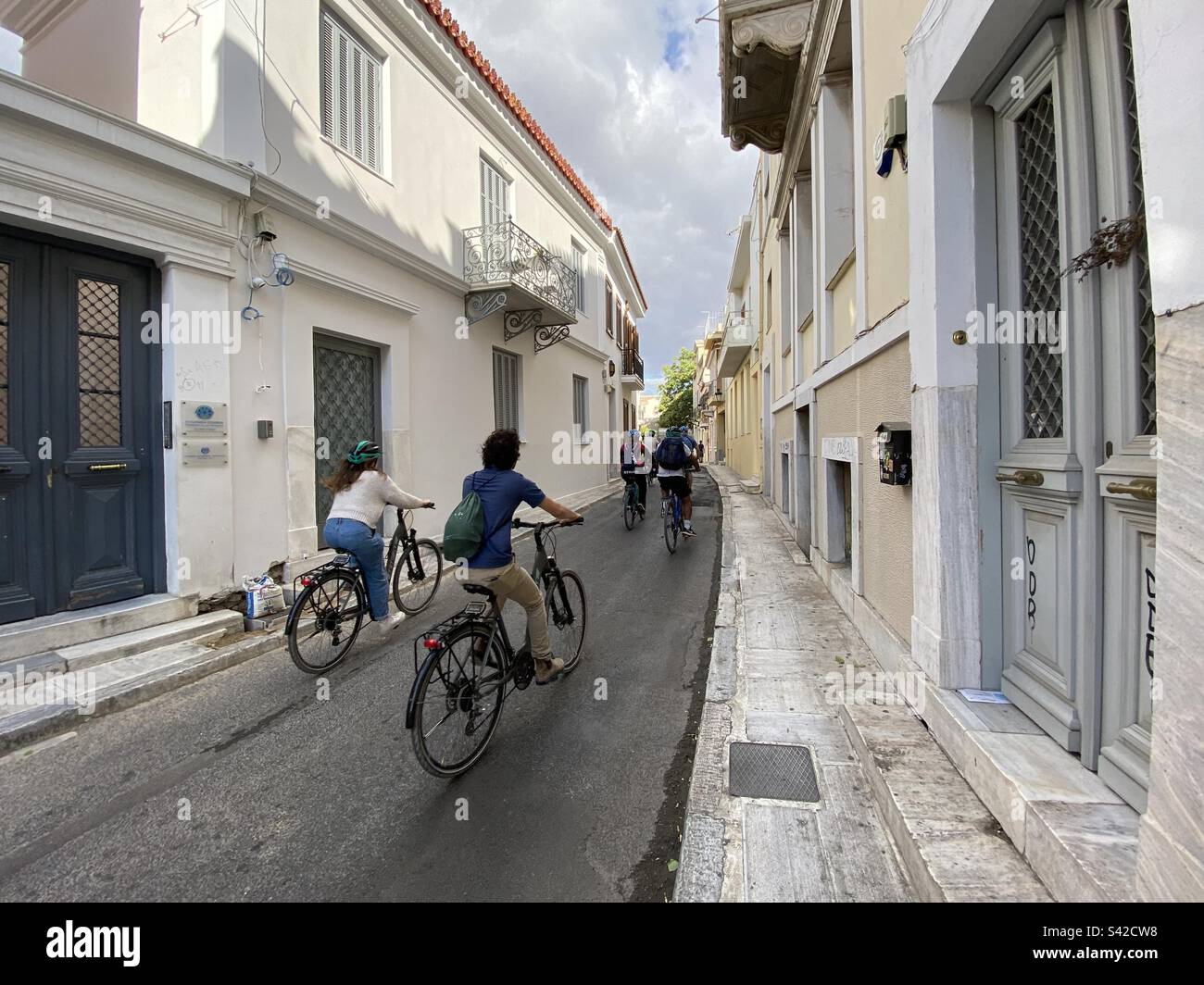 Cycling through the streets of athens, Greece Stock Photo - Alamy