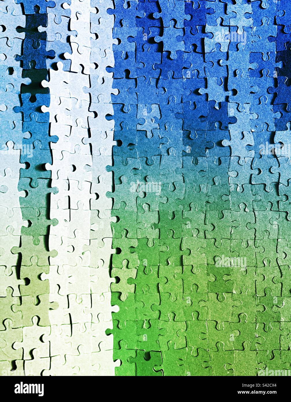 Jigsaw pieces with blue and green colours Stock Photo - Alamy