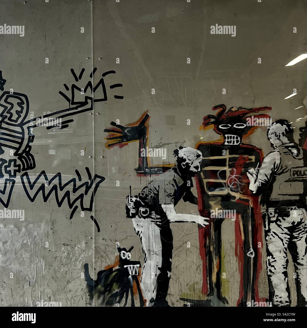 Banksy Art homage to Basquiat on Barbican wall protected by plexiglass ...