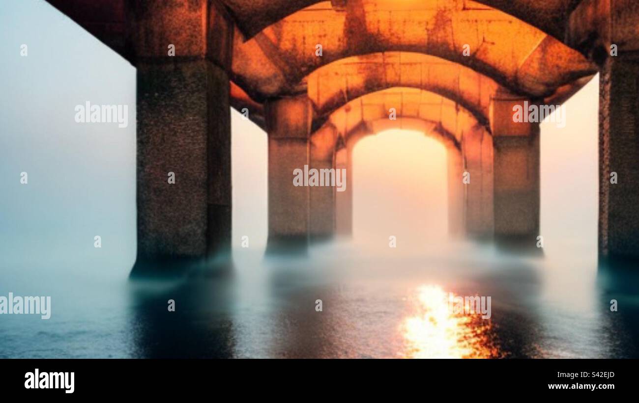 Photo of under a bridge nearing a sunrise in a sea of emotional ...