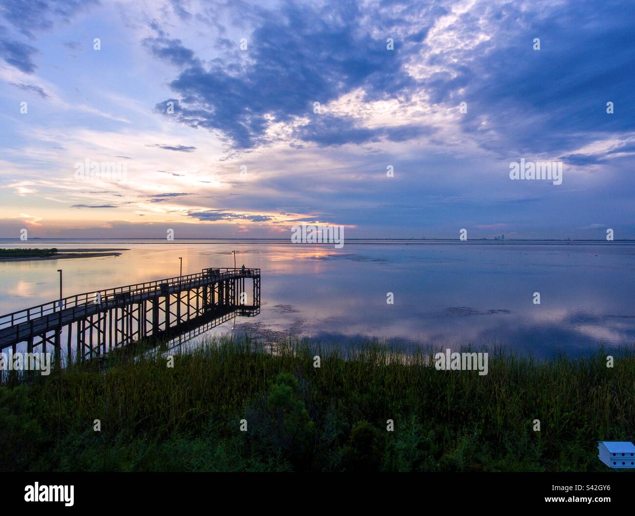Sunset on the eastern shore of Mobile Bay Stock Photo - Alamy