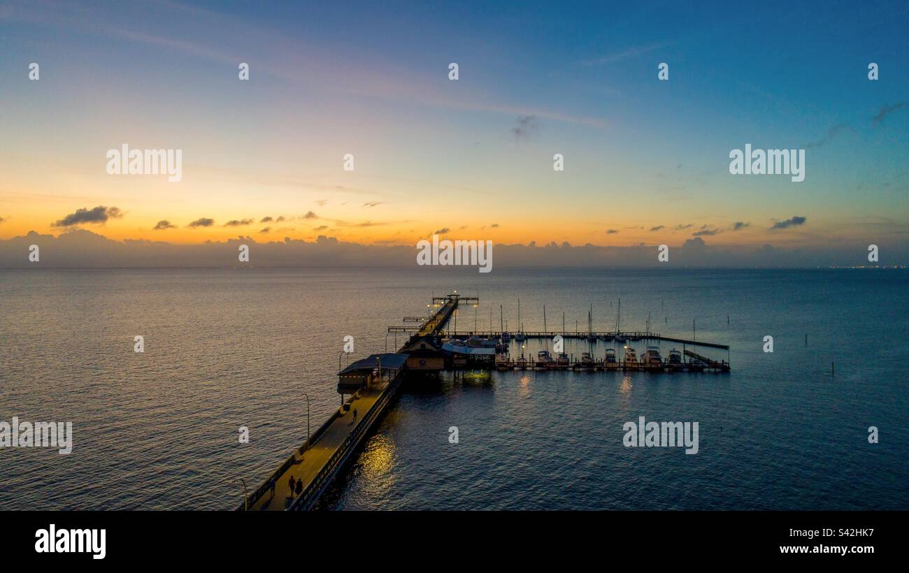 Sunset at the pier Stock Photo - Alamy