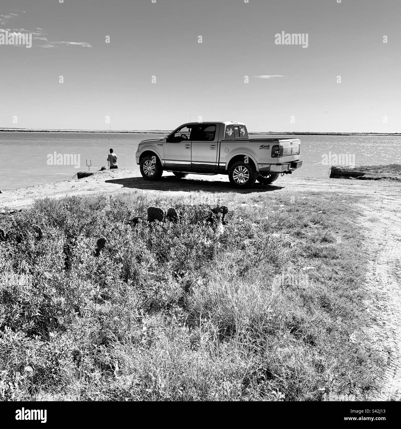 Fishing on the Brownsville Ship Channel, Texas Stock Photo - Alamy