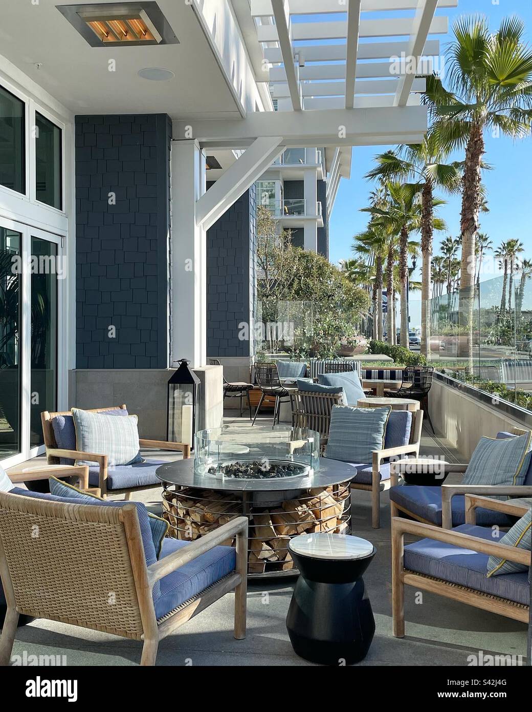 Patio setting along a boardwalk Stock Photo - Alamy