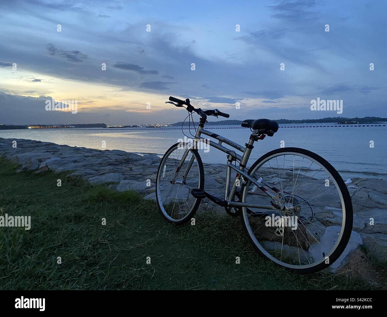 Bicycle beach sunset hi-res stock photography and images - Alamy