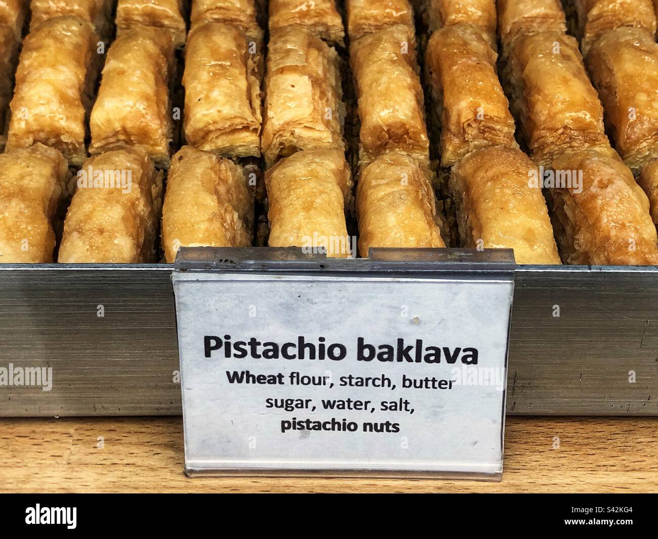 Pistachio Baklava a Middle Eastern sweet treat in bakery window Stock ...