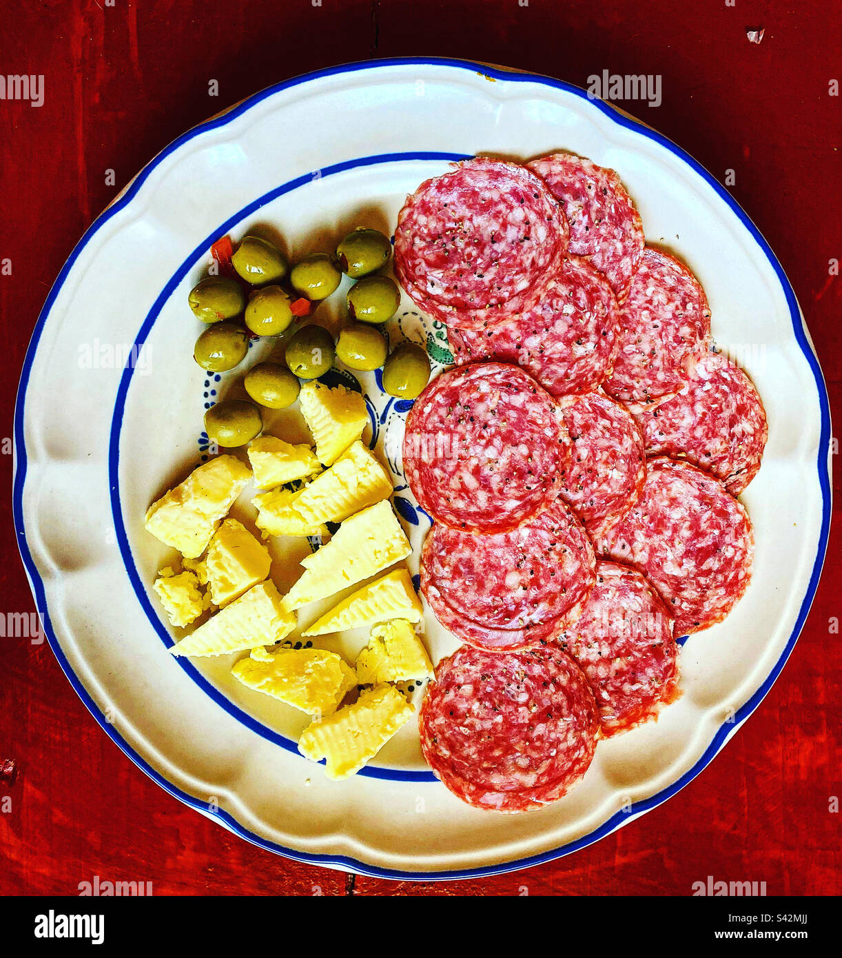Spanish salchichon, cheese and olives in a plate in Queretaro, Mexico ...