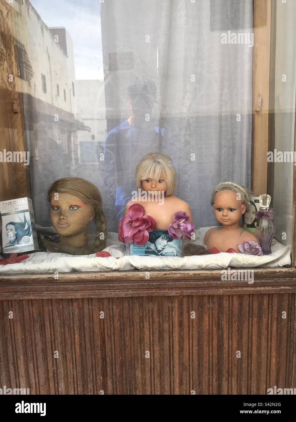 Blonde girl in window hi-res stock photography and images - Alamy