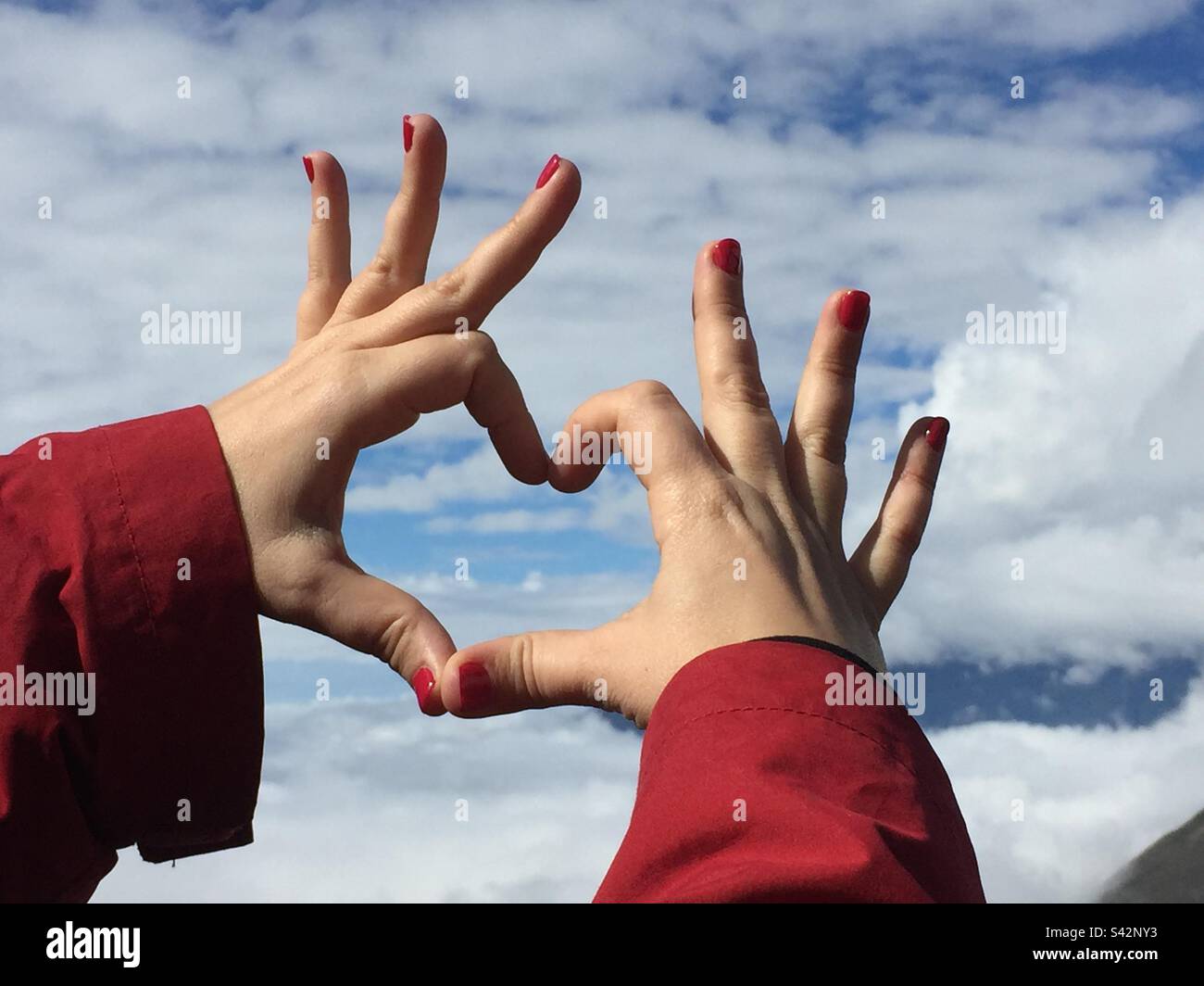Heart shaped hands hi-res stock photography and images - Alamy