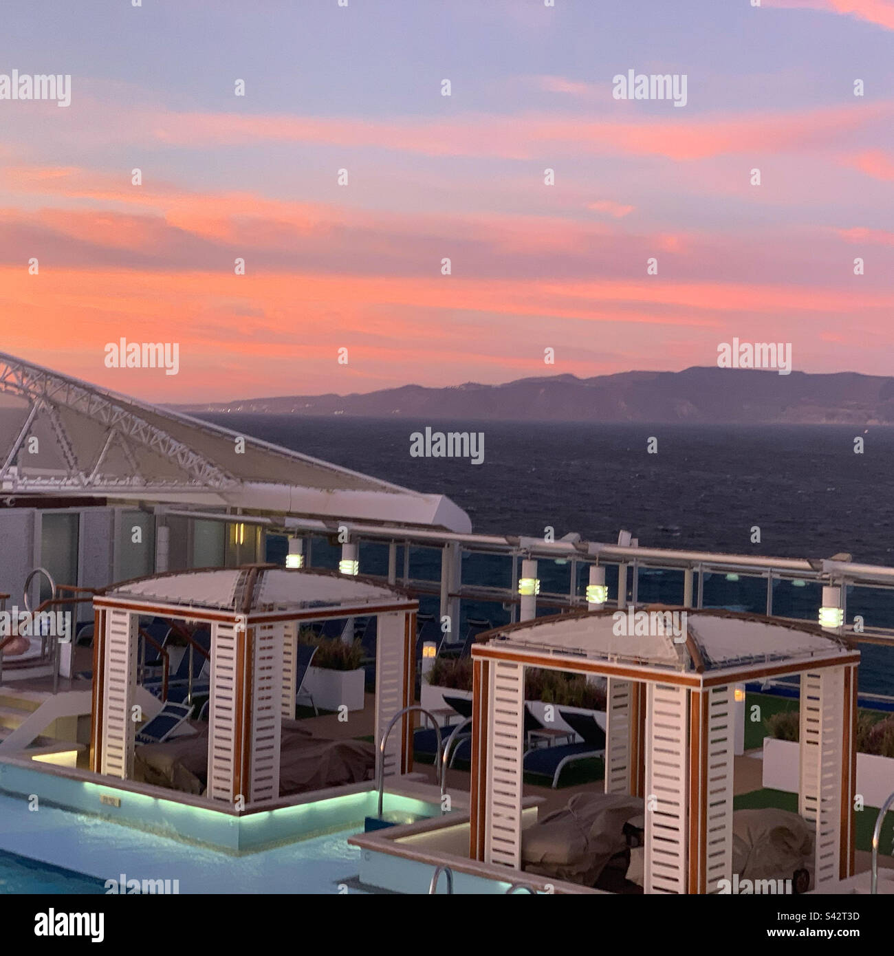 November, 2022, Sunset seen from the Retreat Pool on the Royal Princess ...