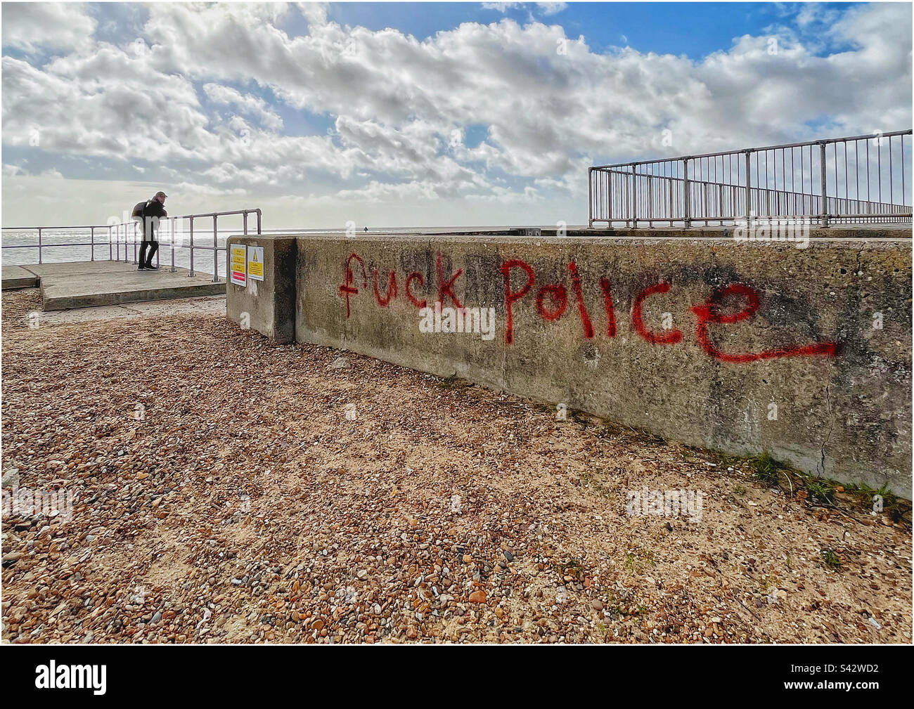Anti-police sentiments sprayed on a wall on Felixstowe beach Stock ...