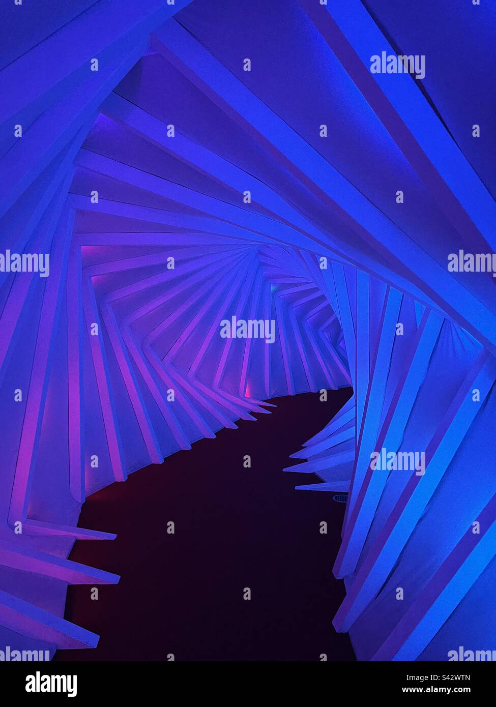 Neon lit tunnel Stock Photo - Alamy