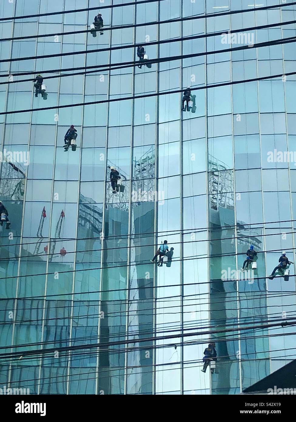Window washers storming a building, Bangkok, Thailand Stock Photo - Alamy