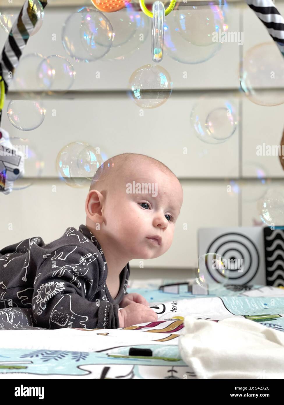 Baby in bubbles hi-res stock photography and images - Alamy