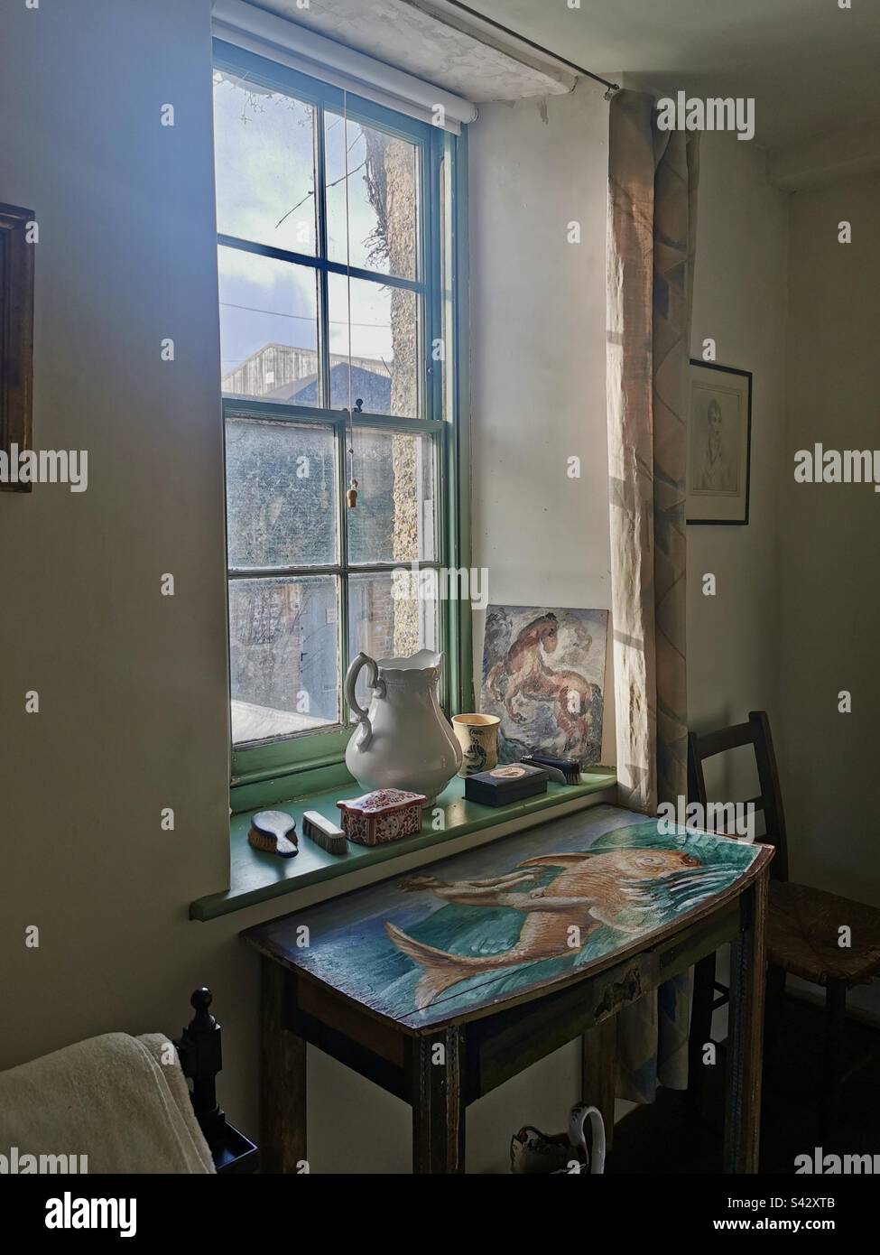 Hand painted table by windows by Bloomsbury society Charlestone House ...