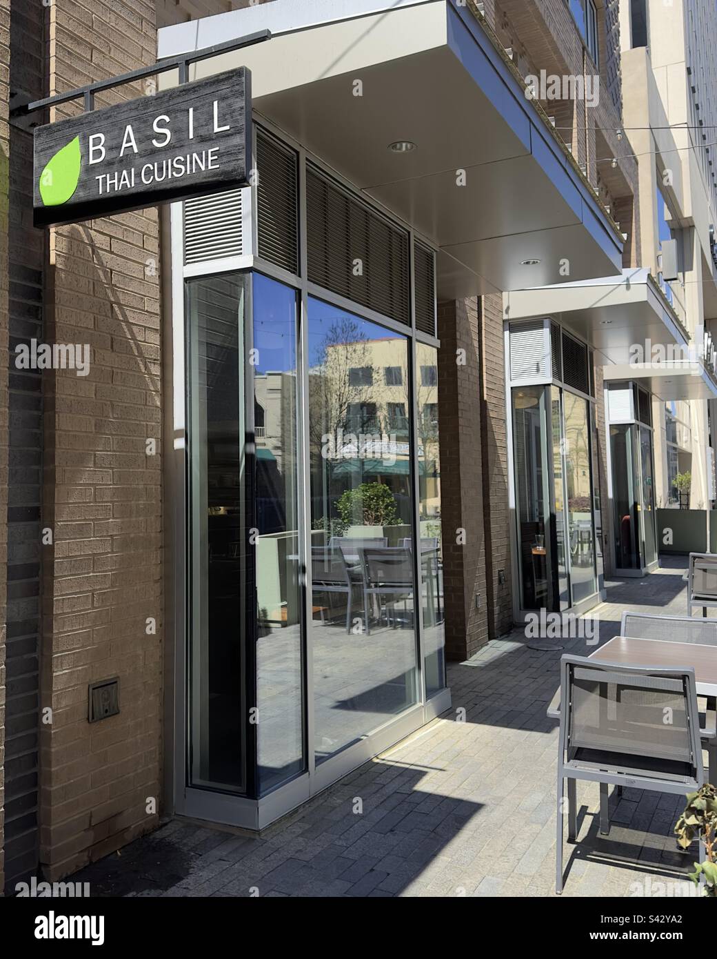 Basil Thai Cuisine store front Stock Photo - Alamy