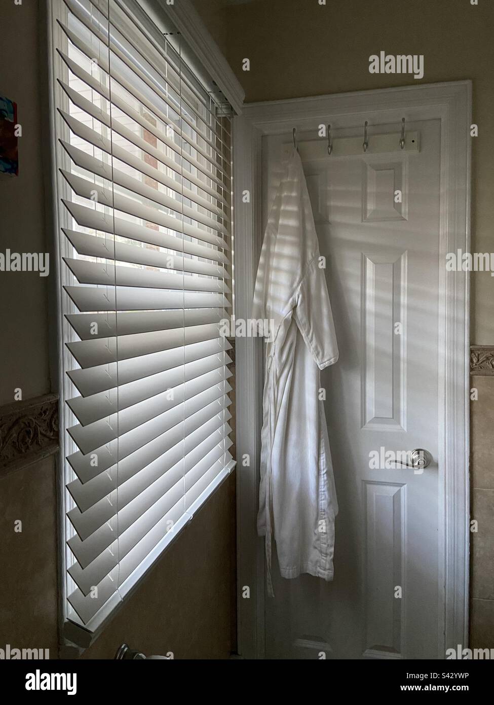 Door with robe hi-res stock photography and images - Alamy