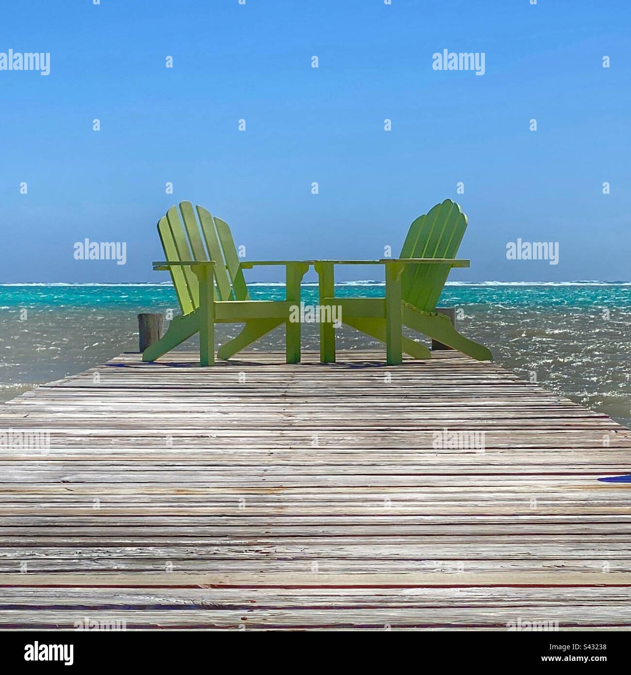 Isla Bonita, San Pedro Belize with empty isolated deck chairs Stock ...