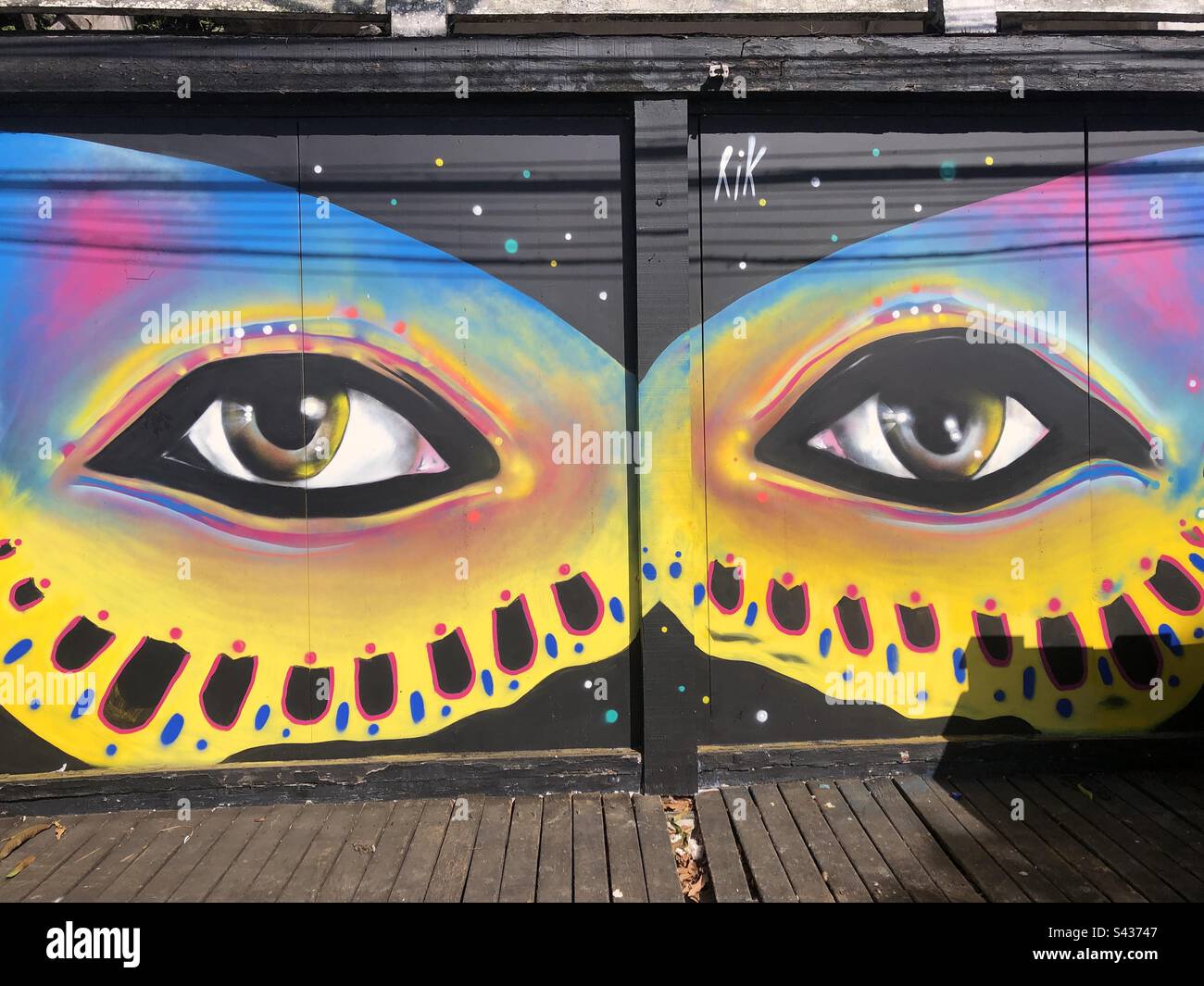 Street art - colourful painted eyes in the shape of a butterfly Stock ...