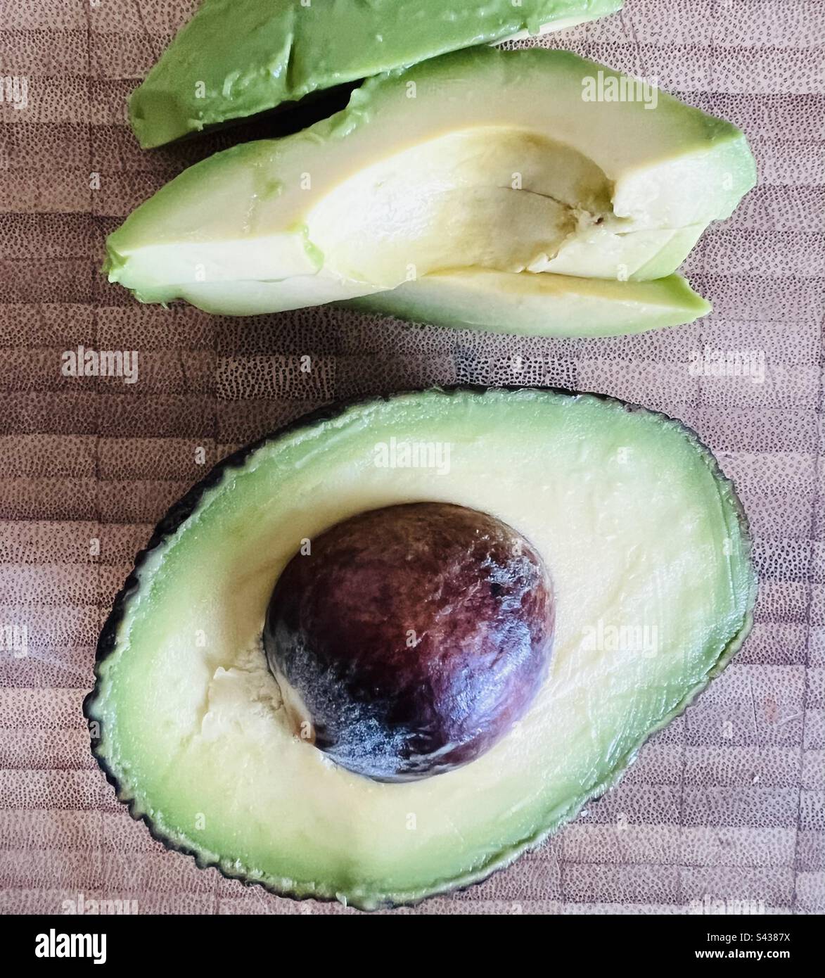 Cut the avocado hi-res stock photography and images - Alamy