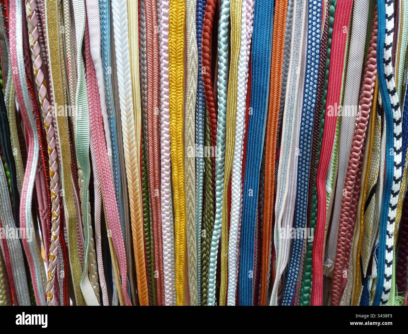 Selection of colourful fabric trims and kimono cords in Japan Stock ...