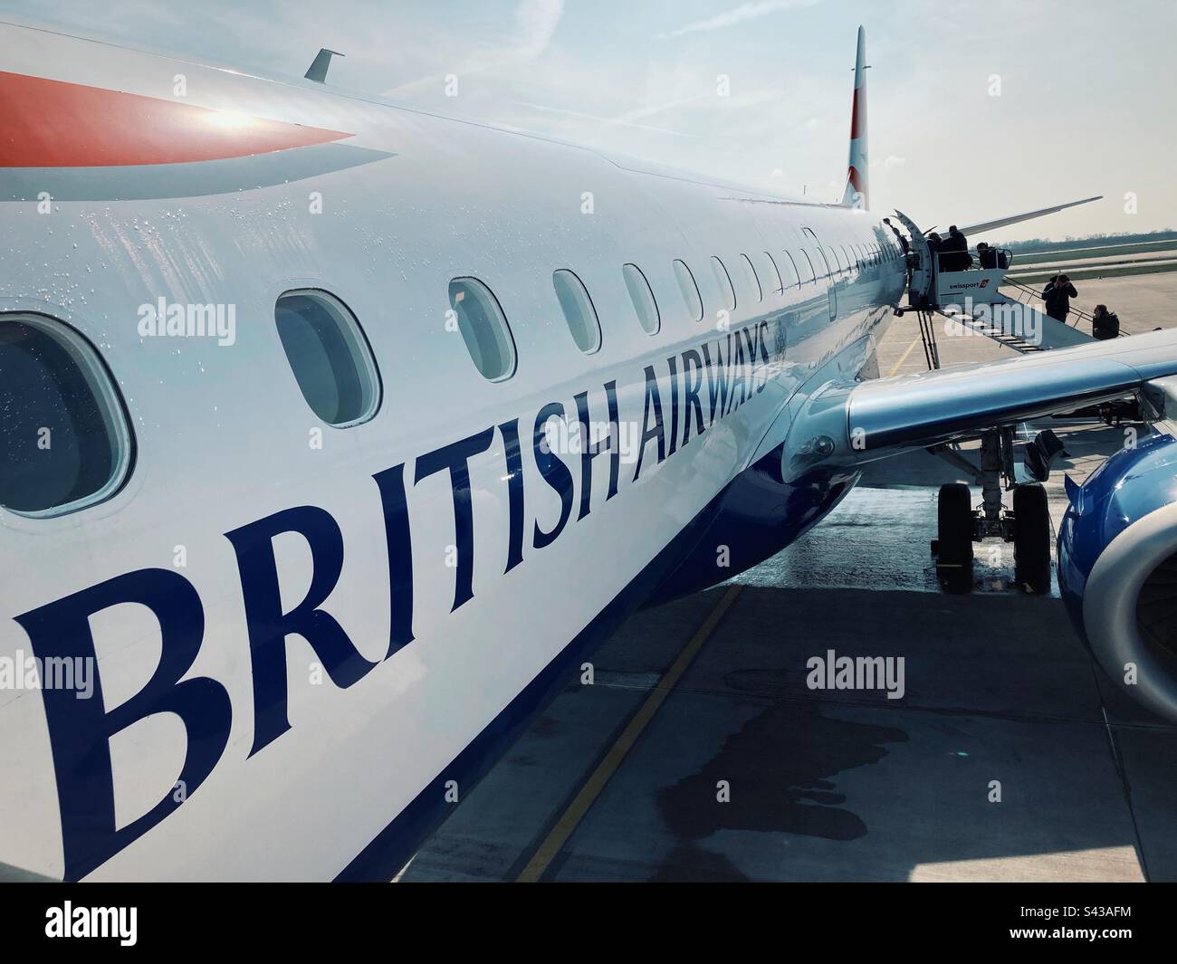 Boarding a British Airways Embraer 190 in Berlin Stock Photo - Alamy