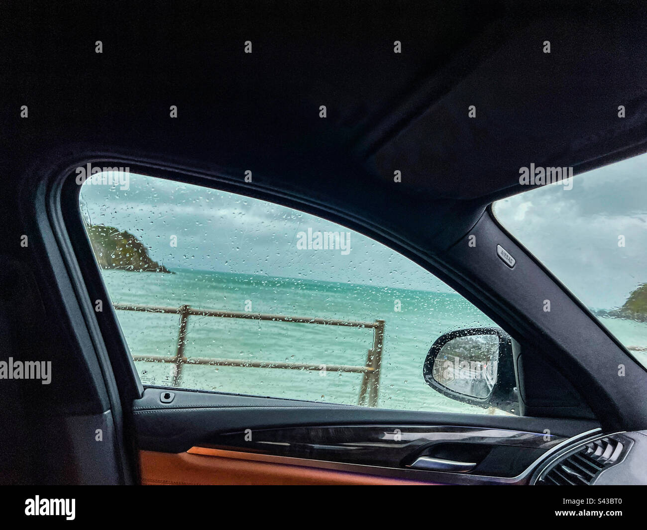 View of Portmellon beach looking at Mevagissey Bay in Cornwall during ...