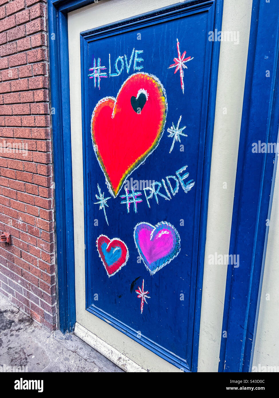 Love and pride sign at baron Bridge End near Briggate in Leeds City ...