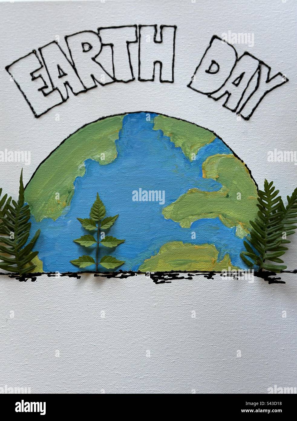 My painted Earth Day design with fresh cut forest plants Stock Photo ...