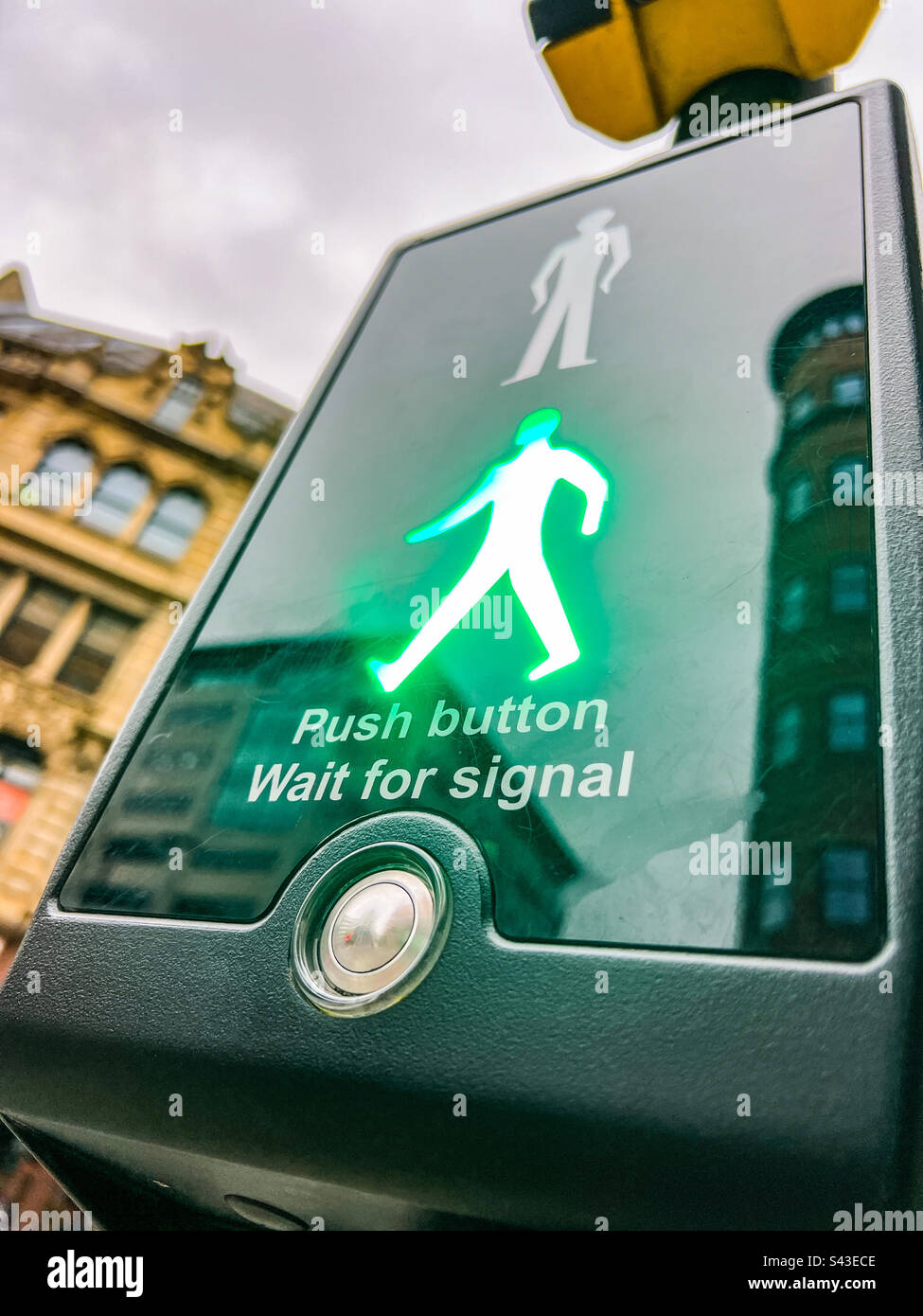 Puffin pedestrian crossing with green man light Stock Photo - Alamy