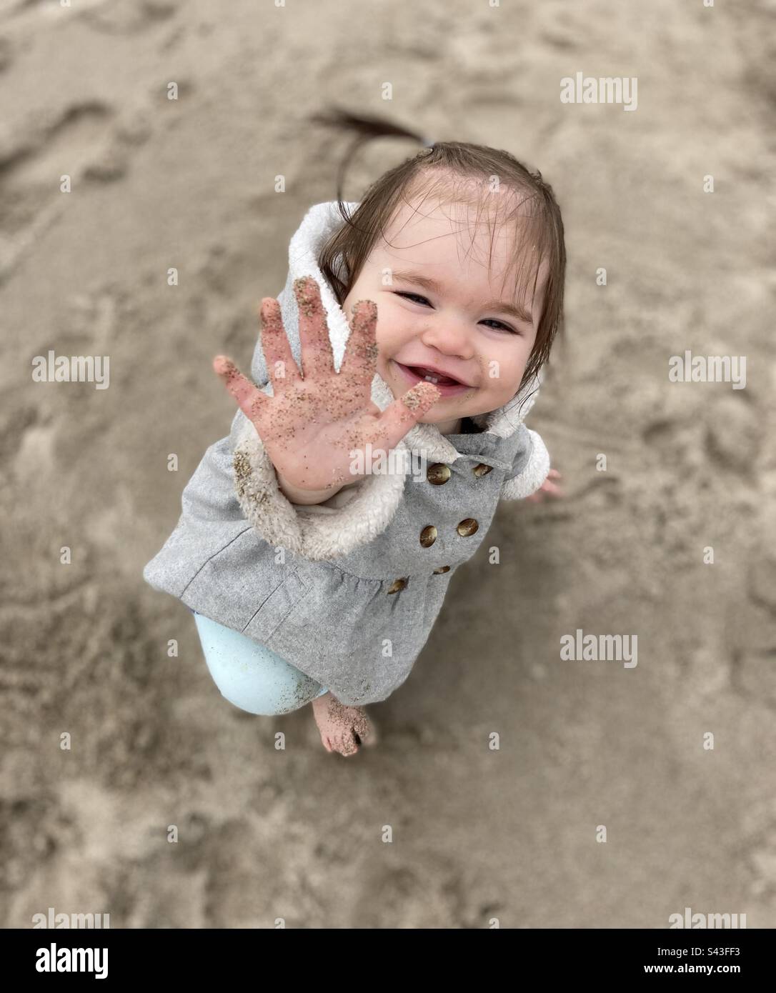 Baby on sand hi-res stock photography and images - Alamy