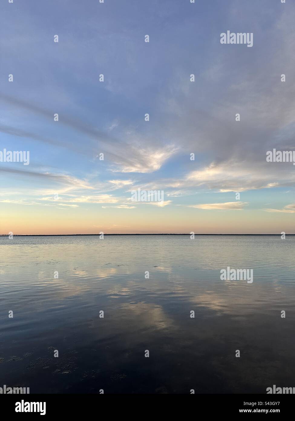 Sunset with reflections over the Choctawhatchee Bay Florida panhandle ...