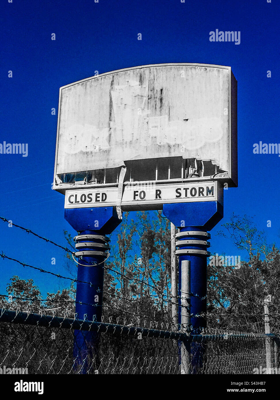 An ominous sign from a now defunct amusement park with a curious ...