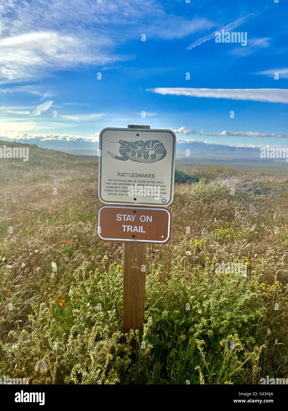 Warning signs like this are common sights along trails in California ...